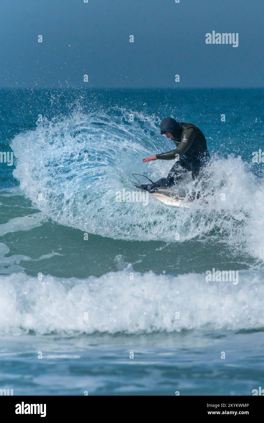 Spectacular surfing action as a surfer rides a wave at Fistral in ...