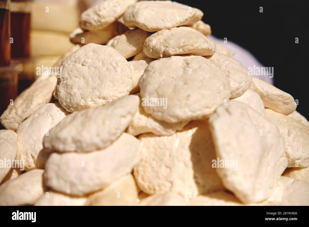 Rounds of homemade artisan Peruvian cheese as seen in Ayacucho, Peru ...