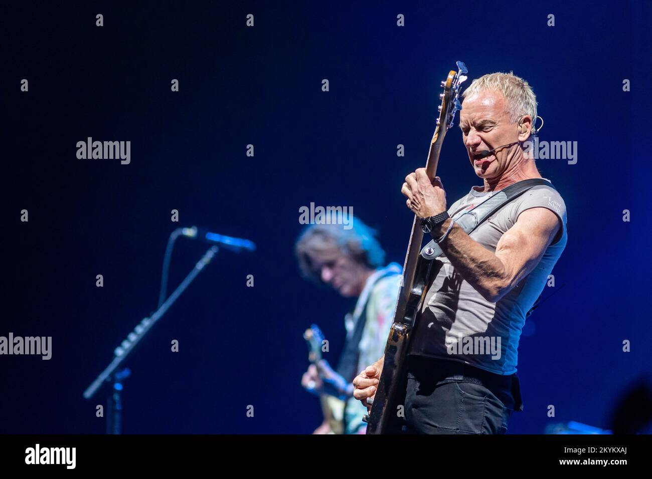 Sting, real name Gordon Sumner, live performance on stage. Bass player ...