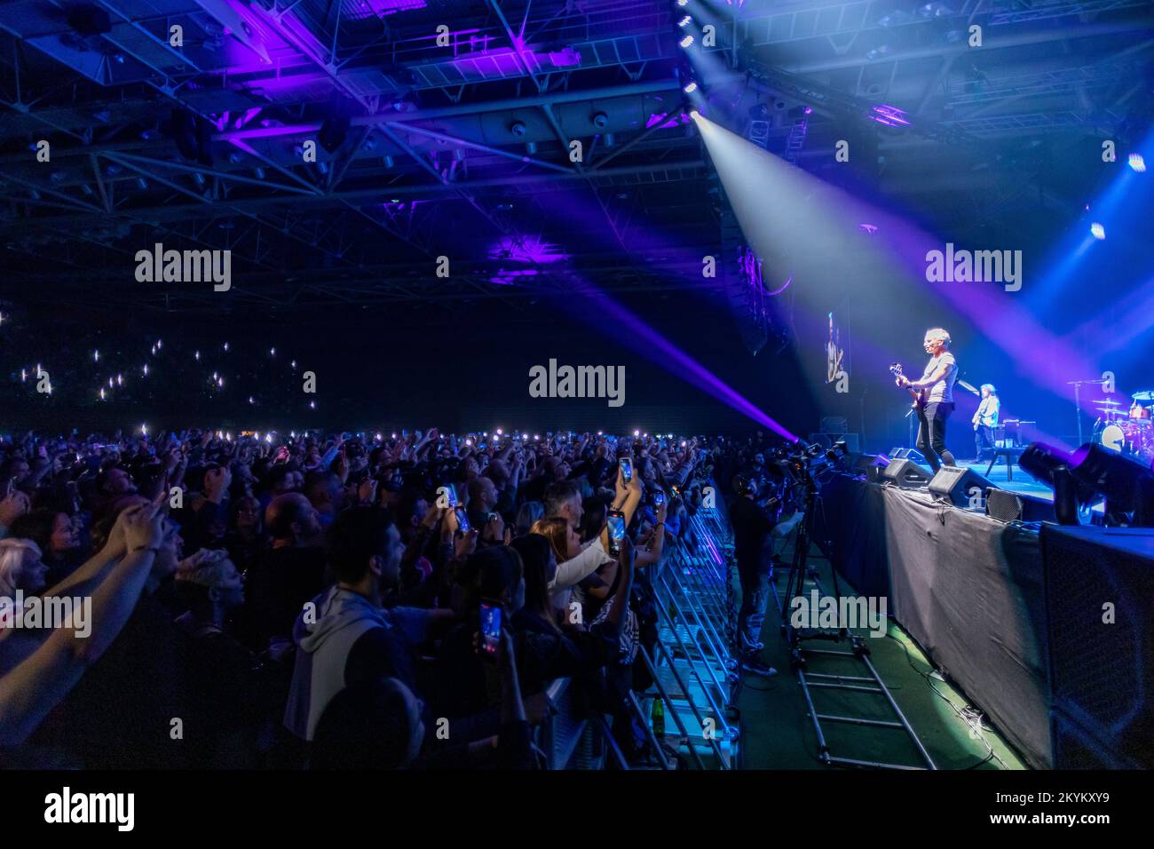 Sting, real name Gordon Sumner, live performance on stage. Bass player ...