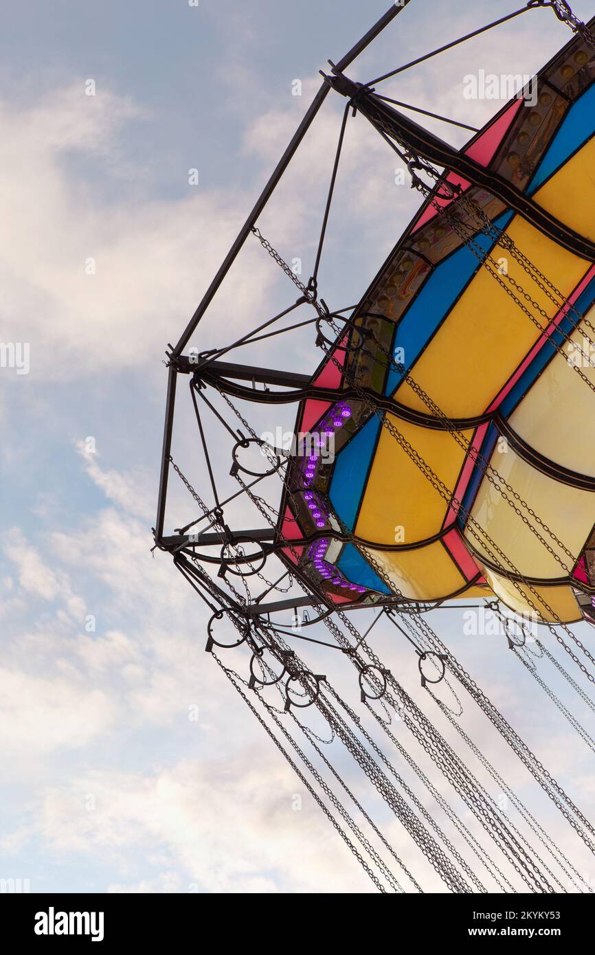 Colorful carousel in a funfair Stock Photo - Alamy