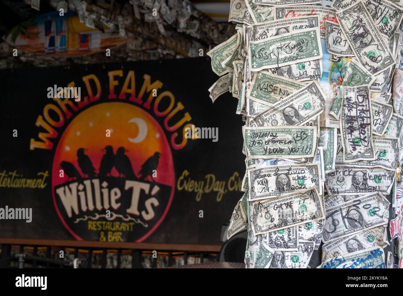 Key West, Florida : Willie T's famous bar pub with many hanging US ...