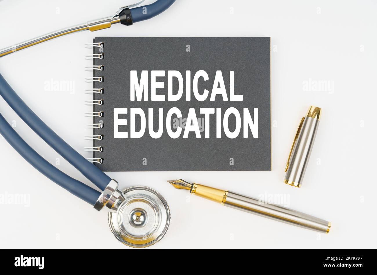 Medicine and health. On a white background lie a stethoscope, a pen and ...