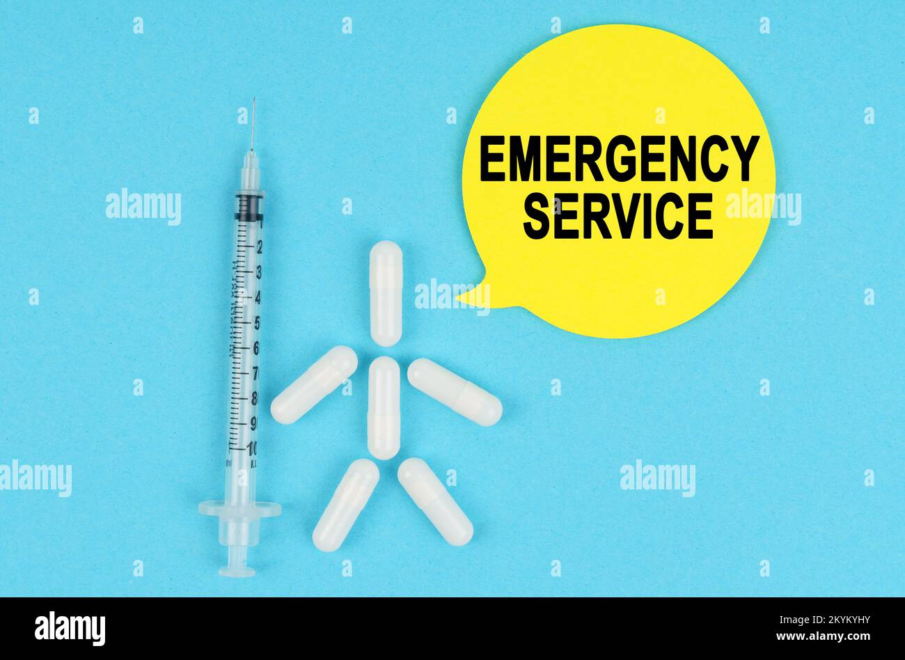 Medicine and health concept. Syringe, human figure made of pills and ...