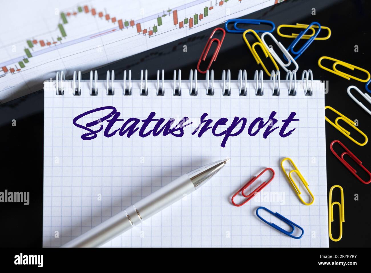 Finance and economics concept. On the desktop are a forex chart, paper ...