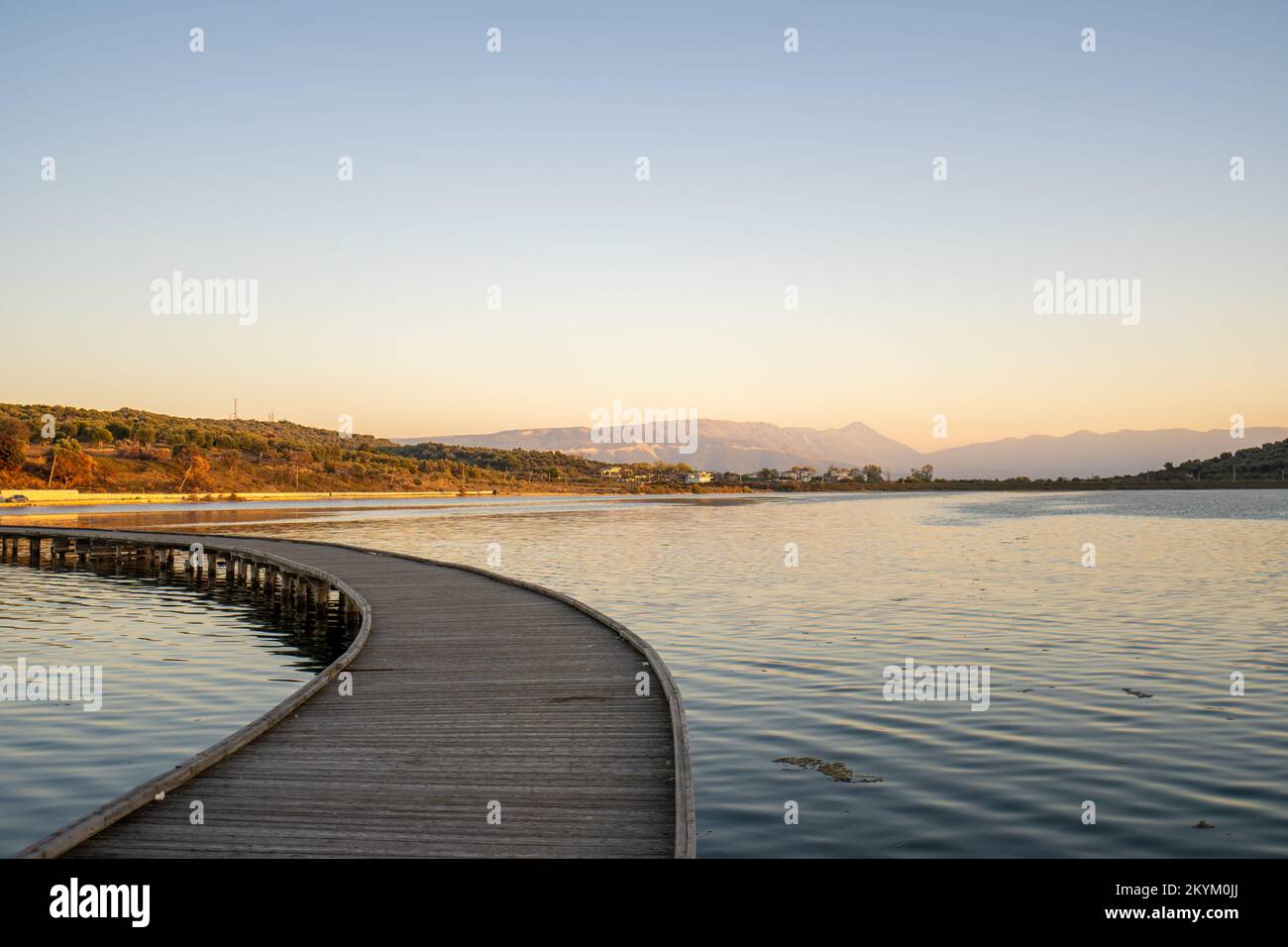 Wooden bridge is leading to the island of Zvernec in Albania nearby ...