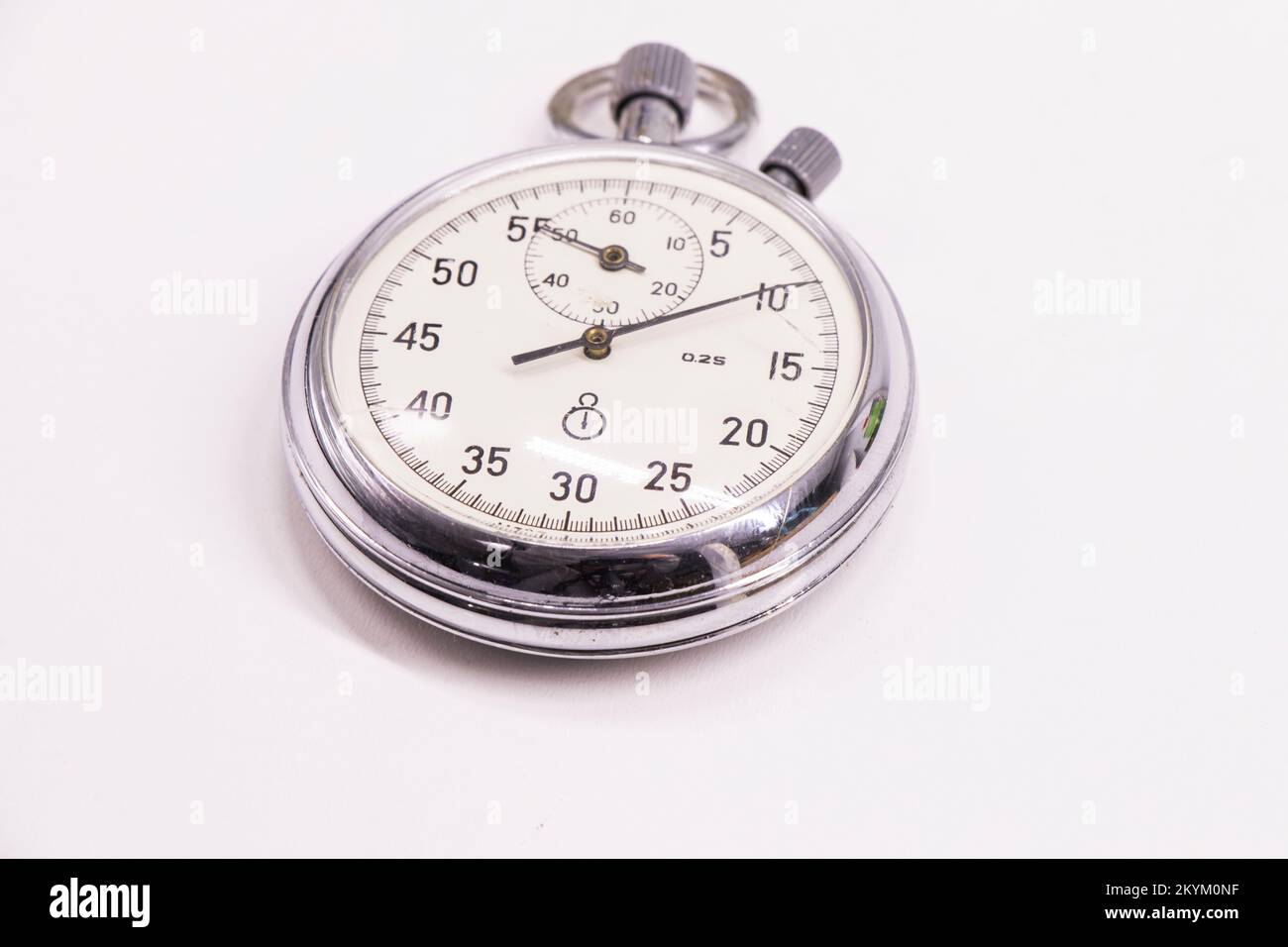 Old antiquary timer clock on the white background Stock Photo - Alamy