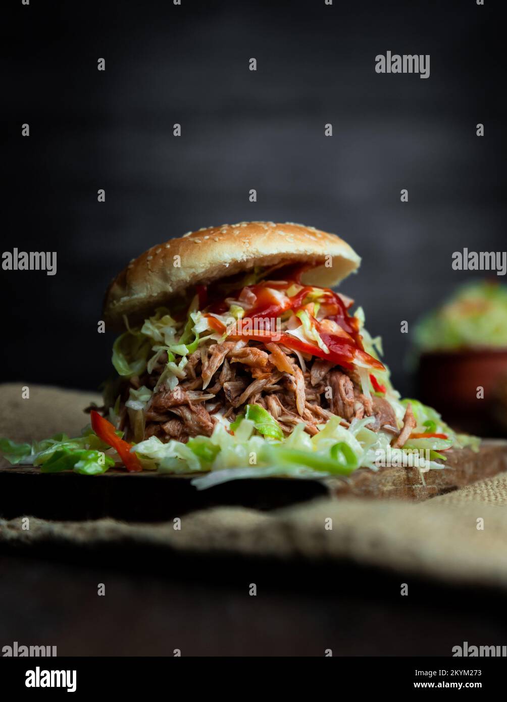 Pulled pork sandwich with coleslaw, buns and seasoning. Pulled pork ...