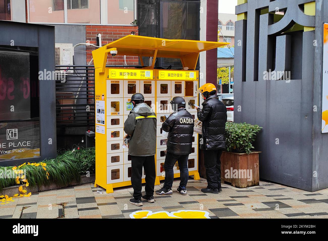 The smart food drawer in front the gate of a working building in ...