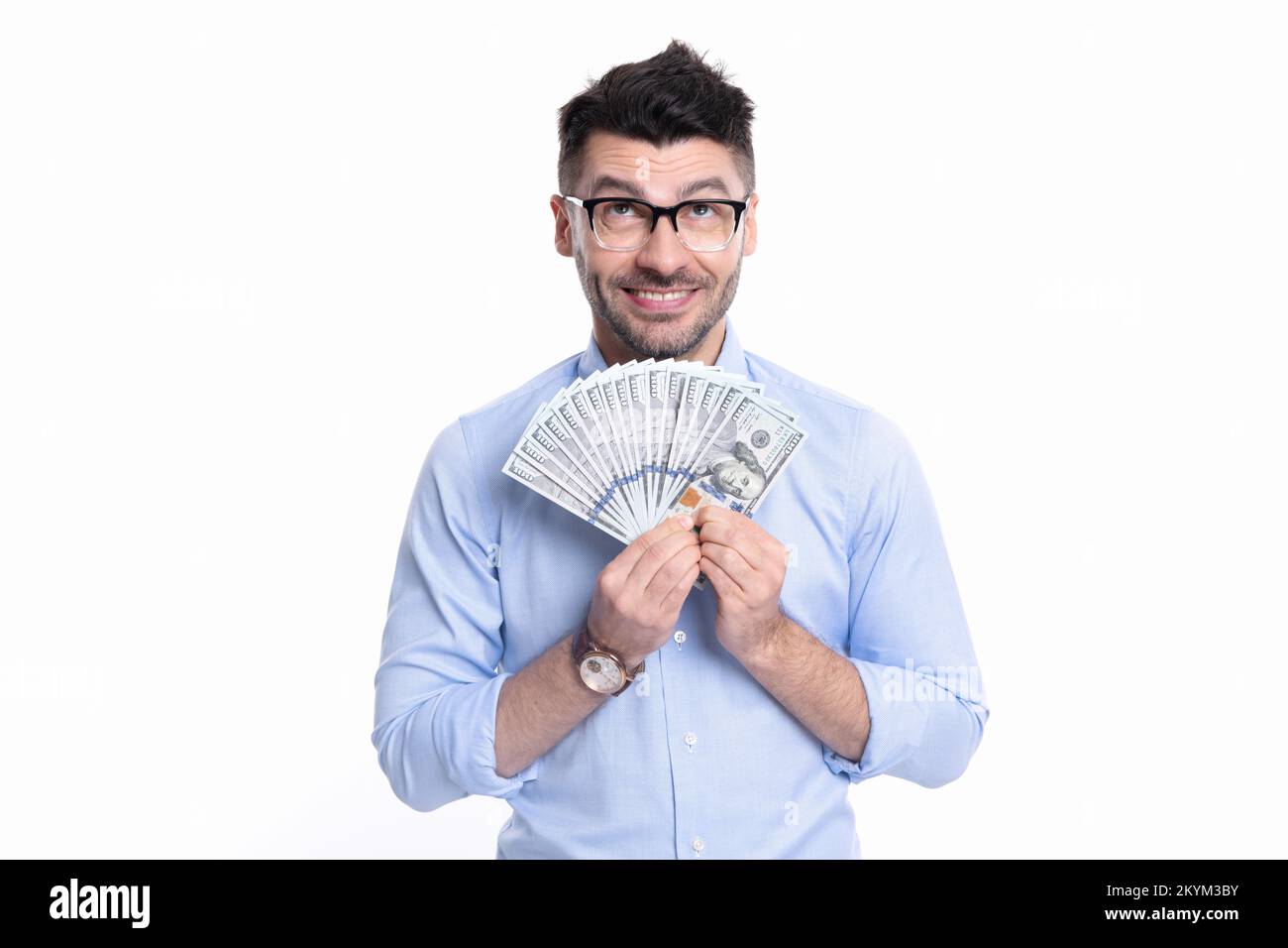 Happy man holding paper money studio. Rich man smiling with money ...