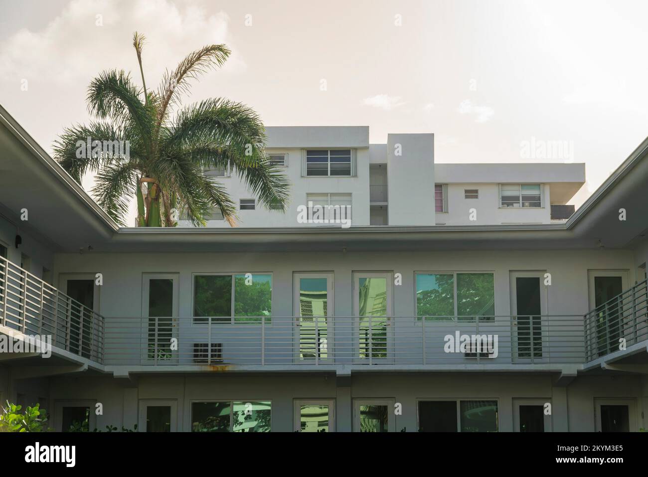 Facade of an apartment with reflective doors and windows at Miami ...