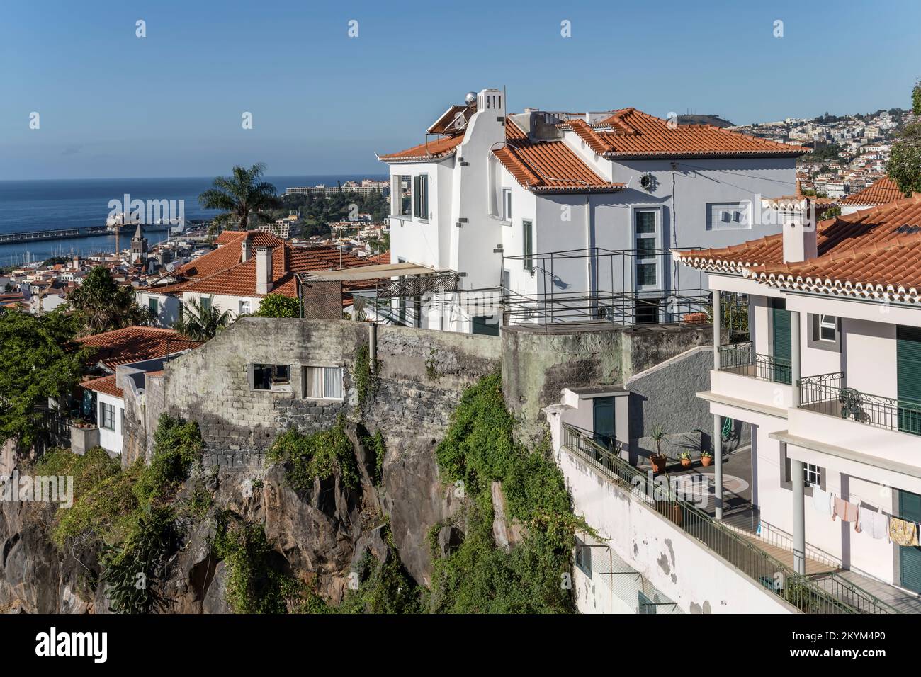 aerial cityscape of historical town with houses on steep cliff, shot in ...