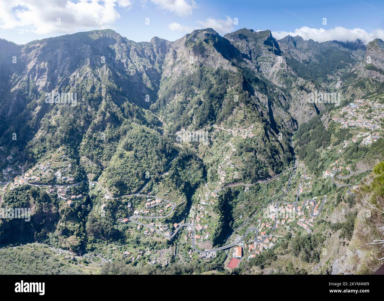 aerial landscape with steep volcanic slopes of green valley and ...