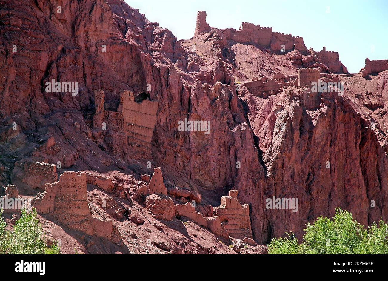 Ruins of Shahr e Zohak (or Zuhak) fortress on red cliffs near Bamyan ...