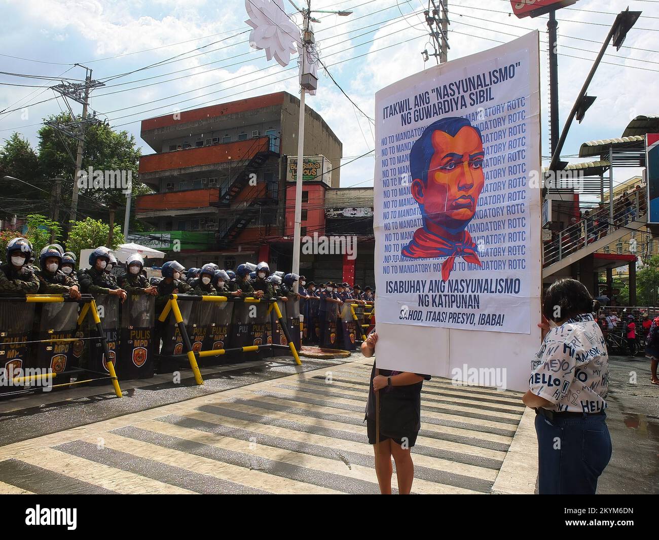 Protesters displayed a huge placard with an illustration of Andres ...