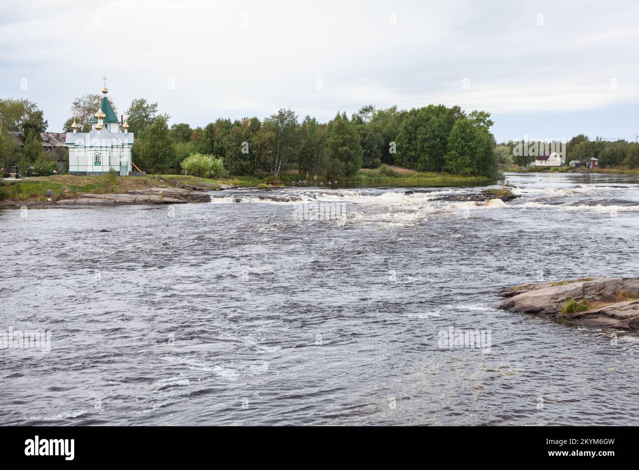 The riverbed of the Nizhny Vyg river around the Soroka Island. Church ...