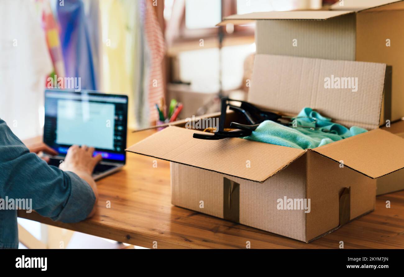 Pre owned clothes resale or donation Stock Photo - Alamy