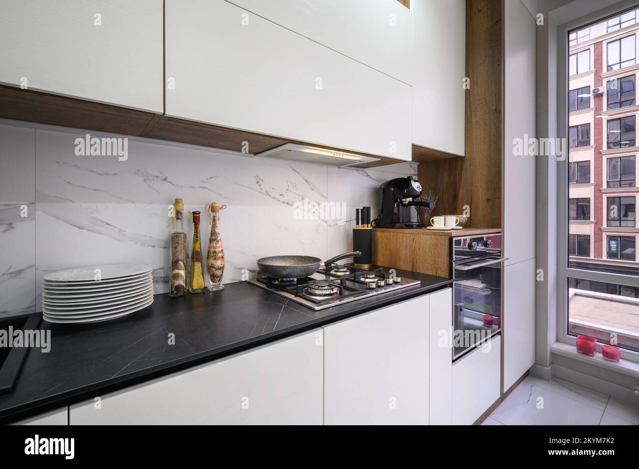 White and black modern luxury kitchen details Stock Photo - Alamy