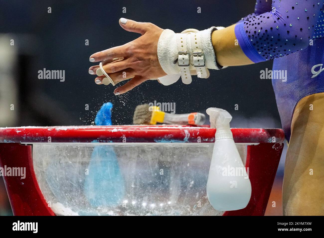 A close up of a gymnastÕs hands preparing for a bars routine Stock ...