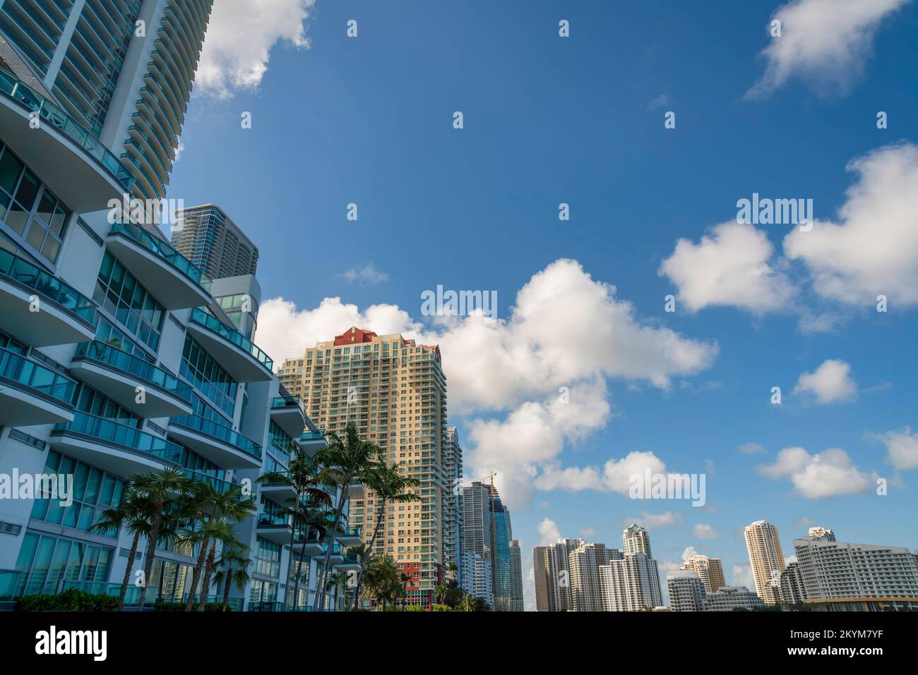 Miami, Florida cityscape with luxury condominiums against the puffy ...