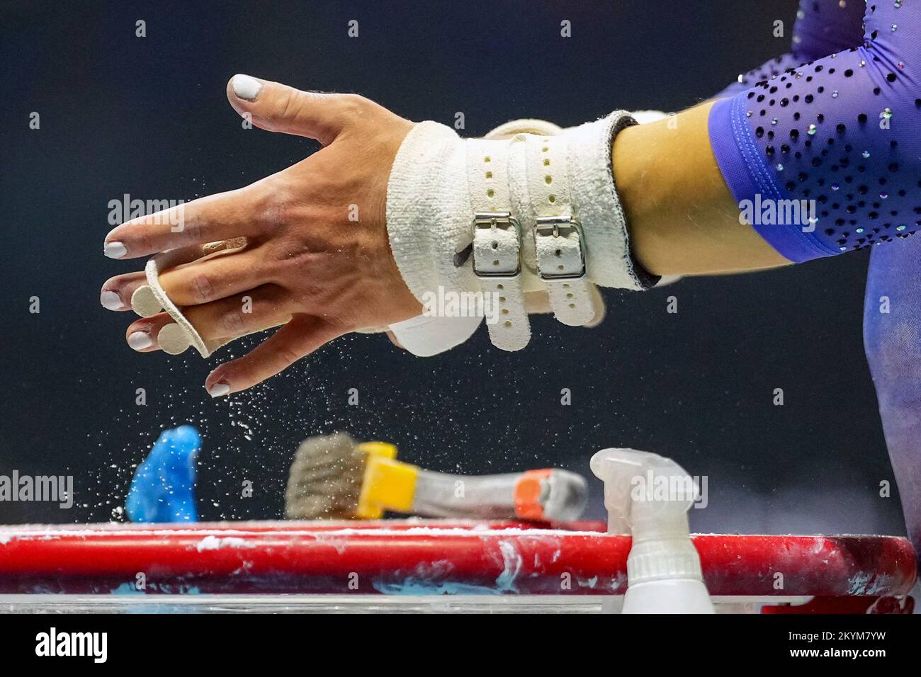 A close up of a gymnastÕs hands preparing for a bars routine Stock ...