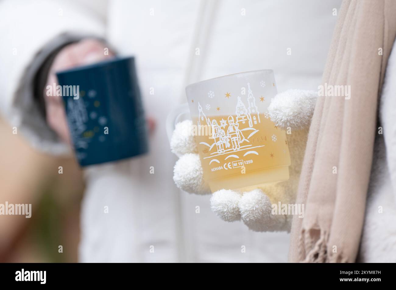 Dresden, Germany. 01st Dec, 2022. Visitors drink mulled wine at the ...