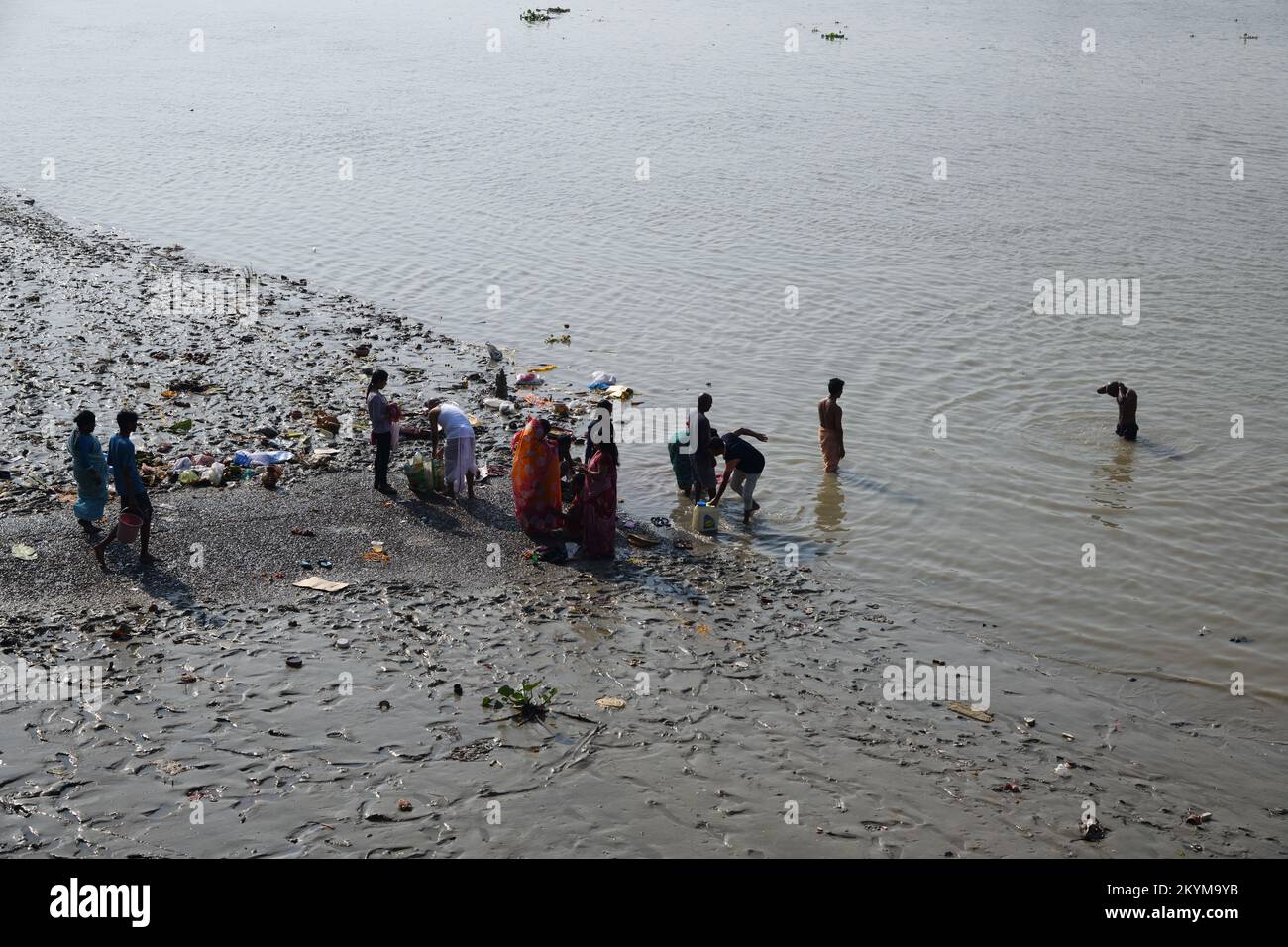 People are taking bath in the Ganges or river Hooghly at Babu Ghat ...