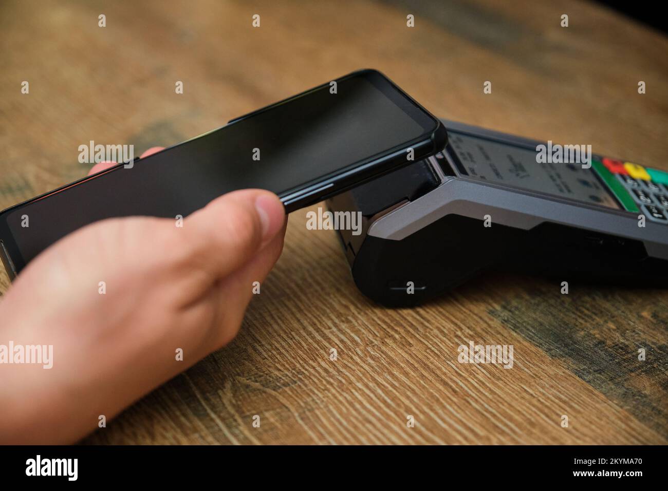 Unrecognizable customer paying the restaurant bill with a virtual ...