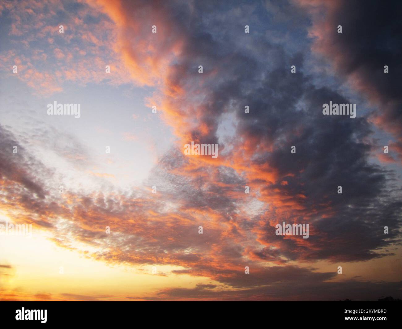 sky sunset red golden clouds Stock Photo - Alamy