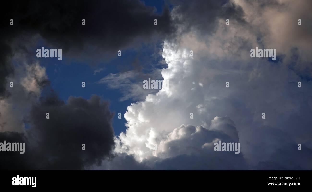Sky with beautiful cumulus clouds and face image Stock Photo - Alamy