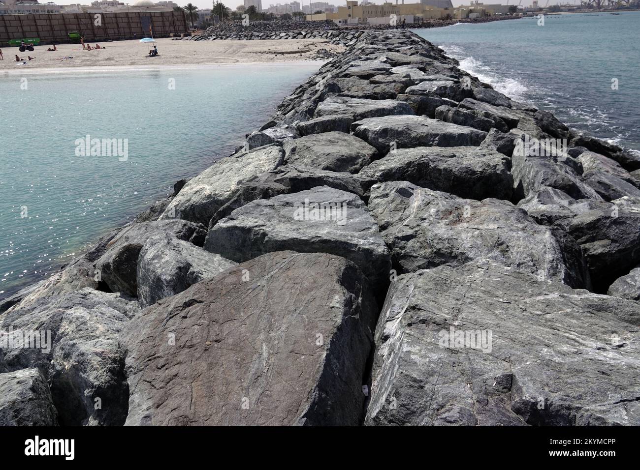 A breakwater from the embankment of huge stones to protect the beach ...