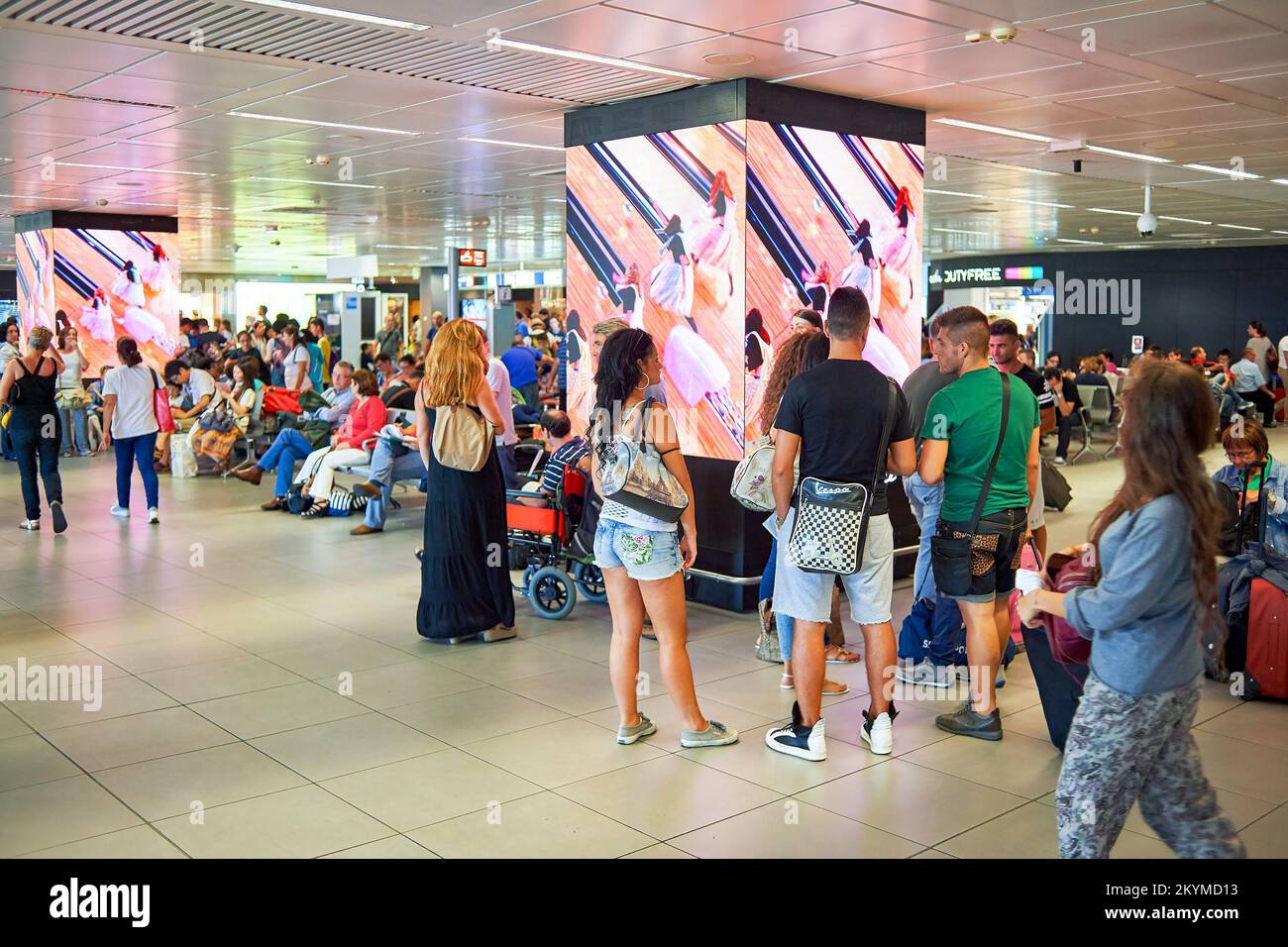 ROME, ITALY - AUGUST 16, 2015: passengers in Fiumicino Airport ...