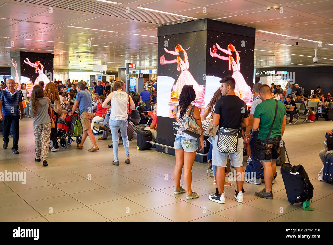 ROME, ITALY - AUGUST 16, 2015: passengers in Fiumicino Airport ...