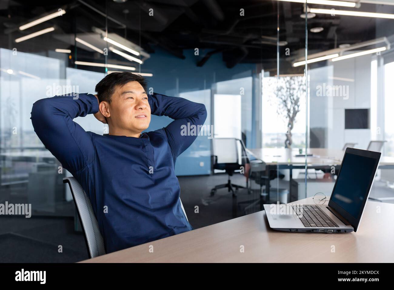 Asian man finished work well, businessman resting in office satisfied ...