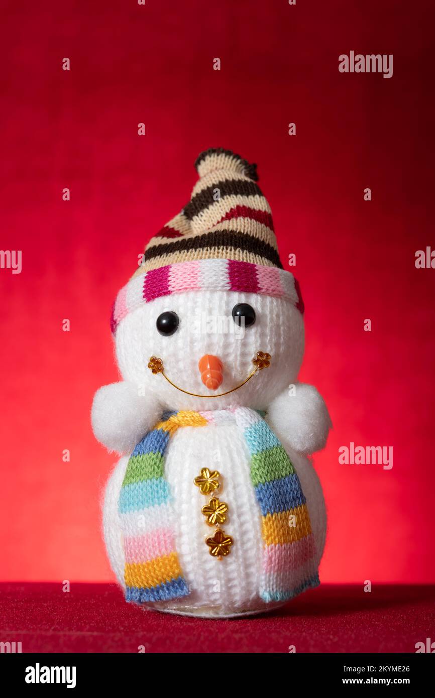 snowman on a red background at vertical composition Stock Photo - Alamy