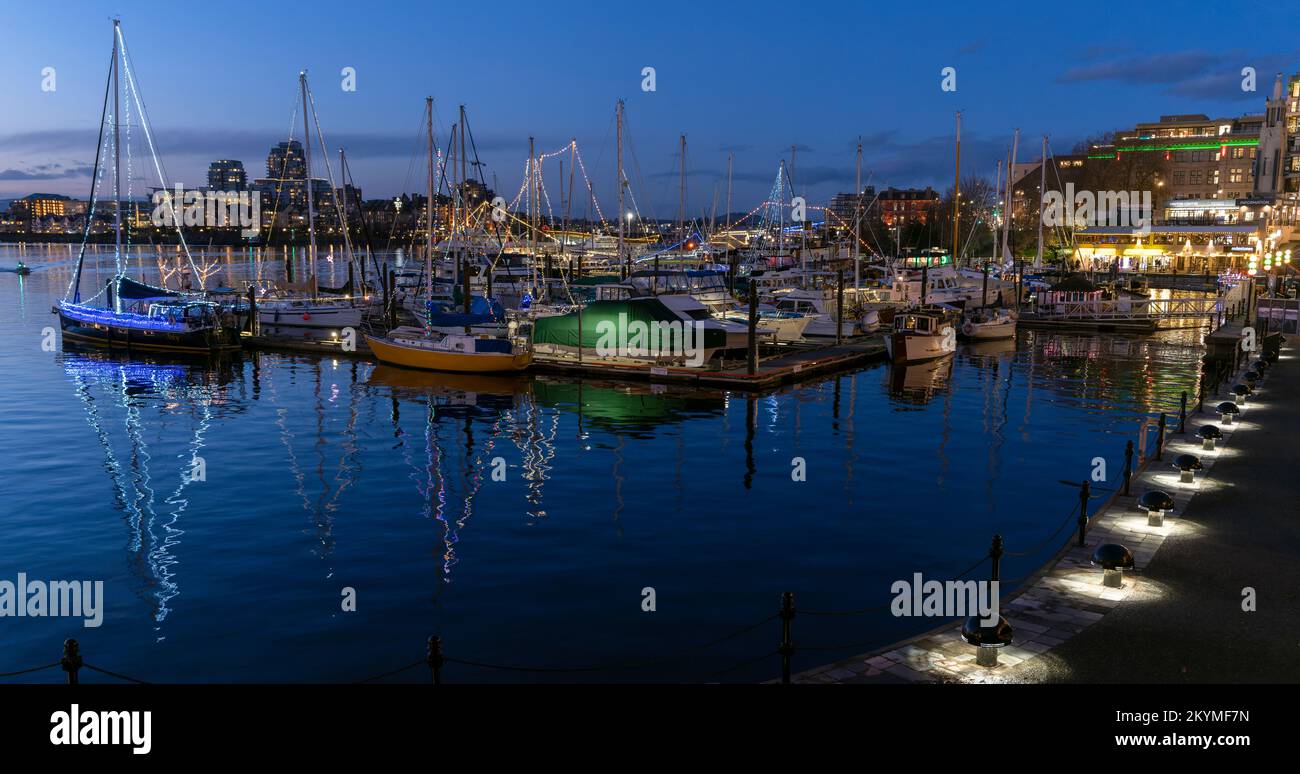 The harbour in Victoria, British Columbia, seen at dusk with holiday ...