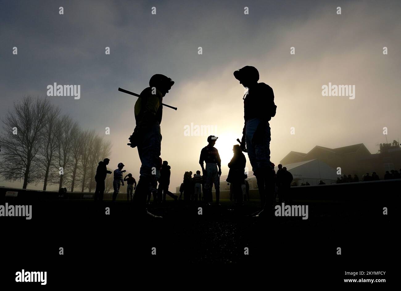 Silhouetted jockeys ahead of the Hatherleigh Farm Three Mile 'National ...