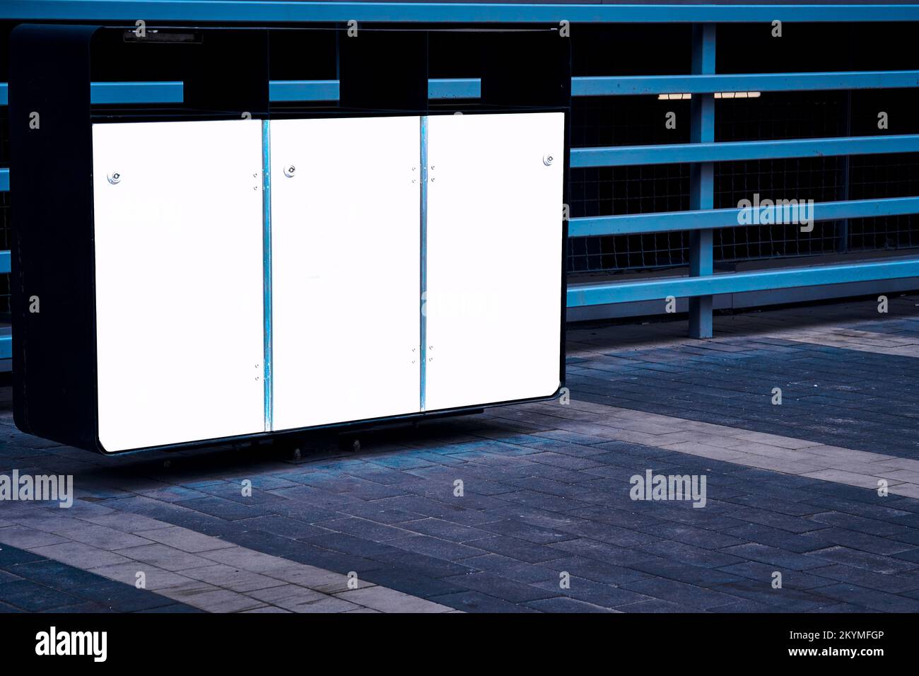 Three outdoor trash containers with white space for text Stock Photo ...