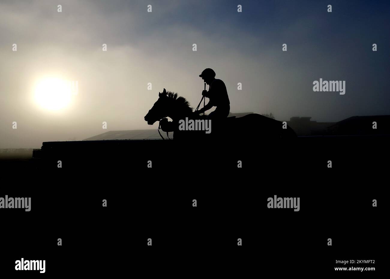 Silhouetted jockeys ahead of the Hatherleigh Farm Three Mile 'National ...
