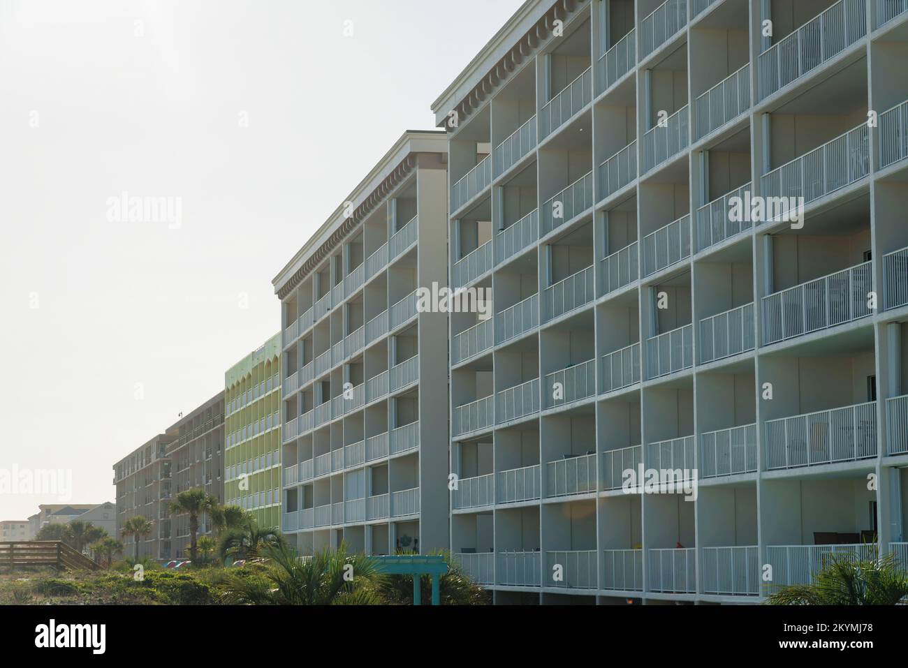 Beachfront hotel buildings with balconies in a row at Destin, Florida ...