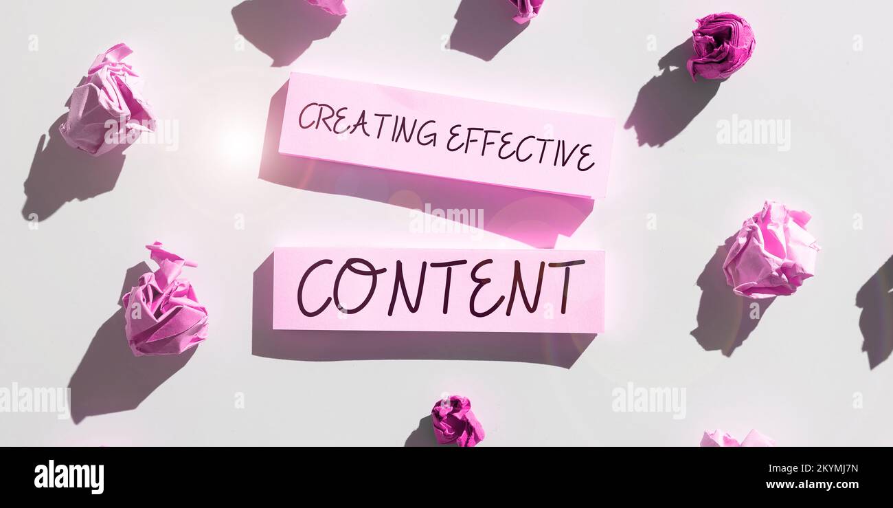 Hand writing sign Creating Effective Content. Business approach ...