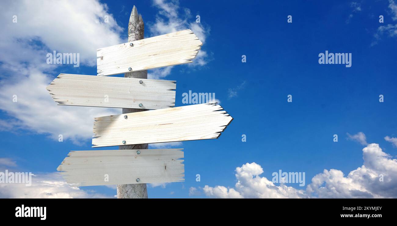Wooden signpost with clear four arrows Stock Photo - Alamy Wooden signpost with clear four arrows Stock Photo - Alamy
