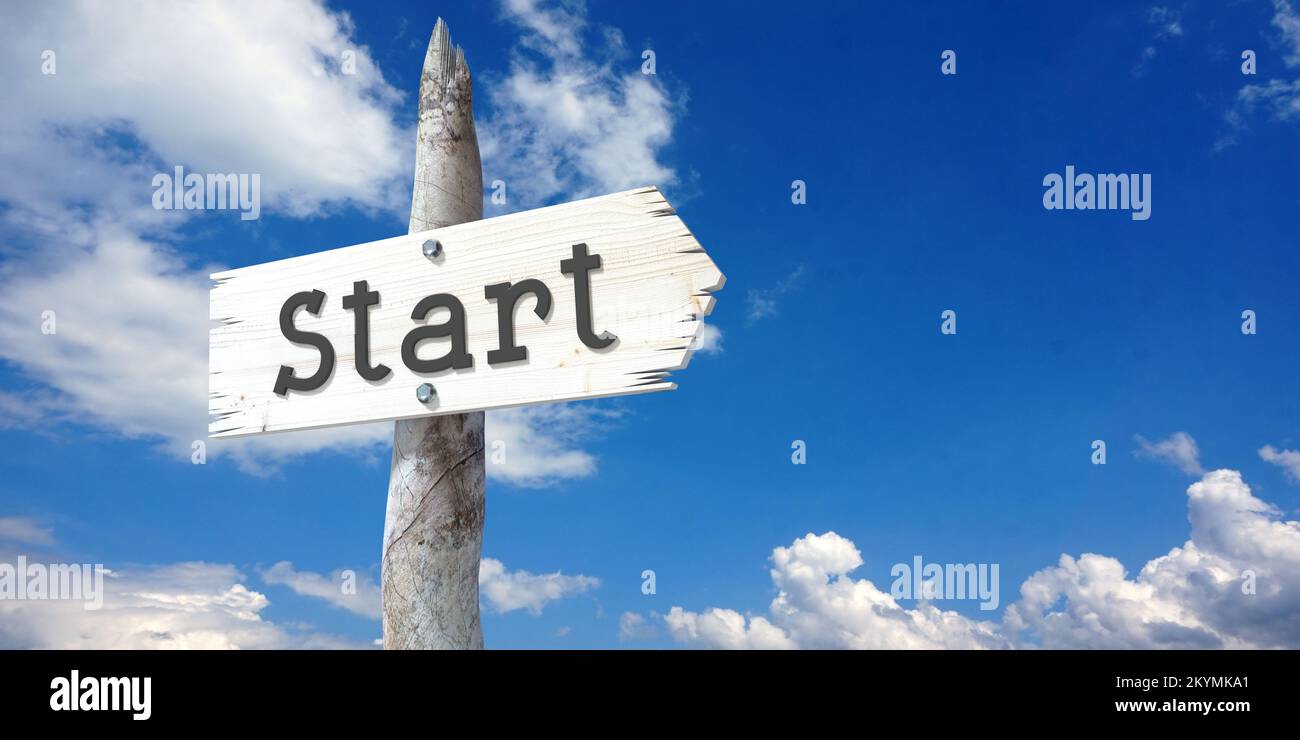 Start - wooden signpost with one arrow Stock Photo - Alamy