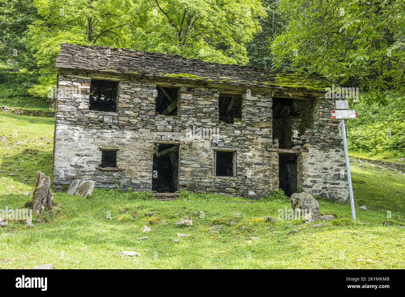 Ruined stone houses and mills in an abandoned mountain village in the ...