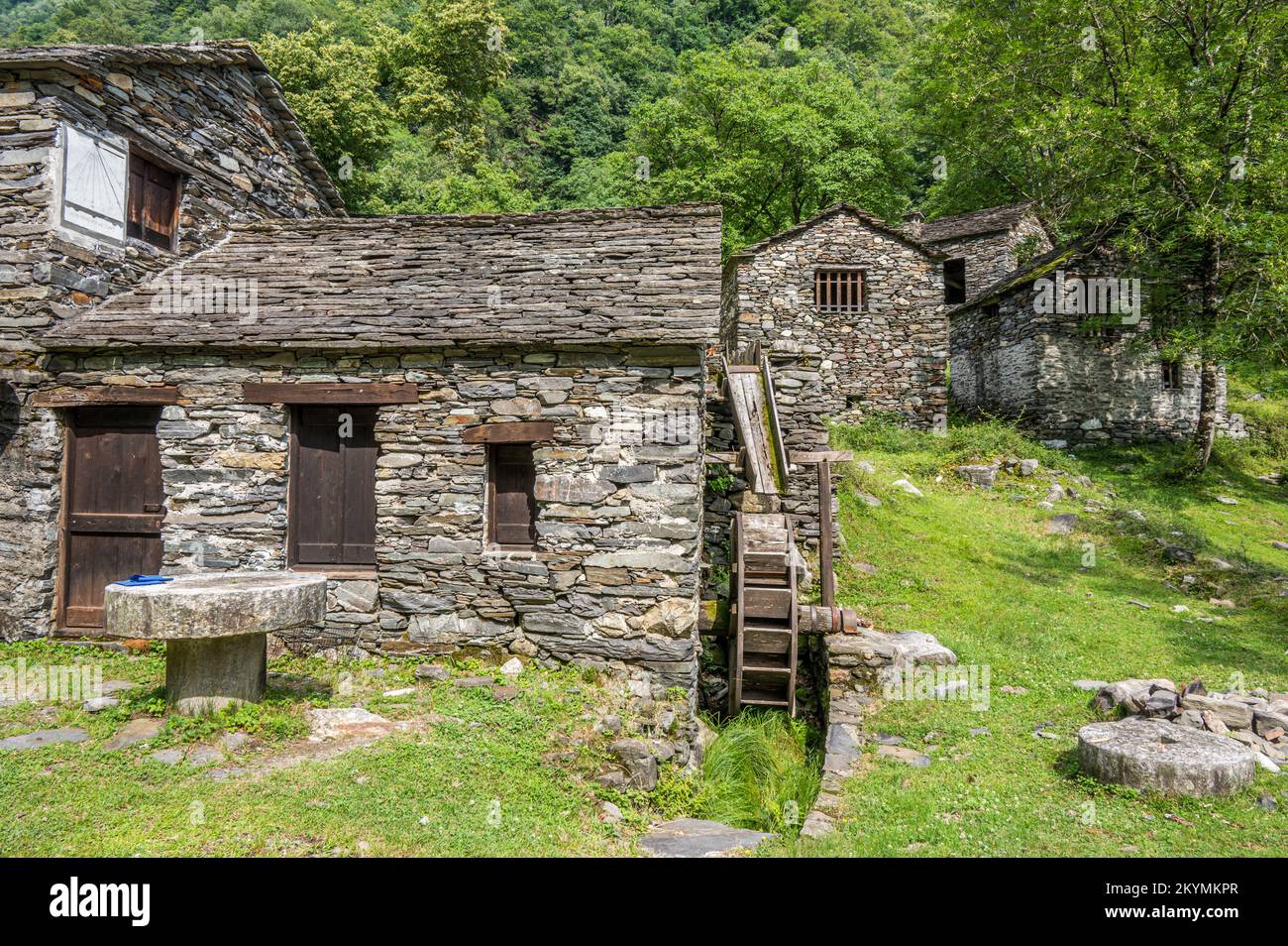 Stone watermill with wooden wheel in an abandoned mountain village in ...