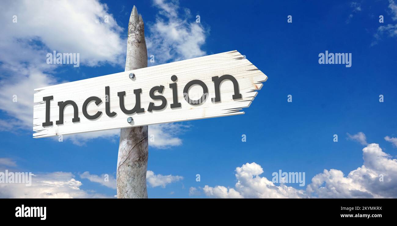 Inclusion - wooden signpost with one arrow Stock Photo - Alamy
