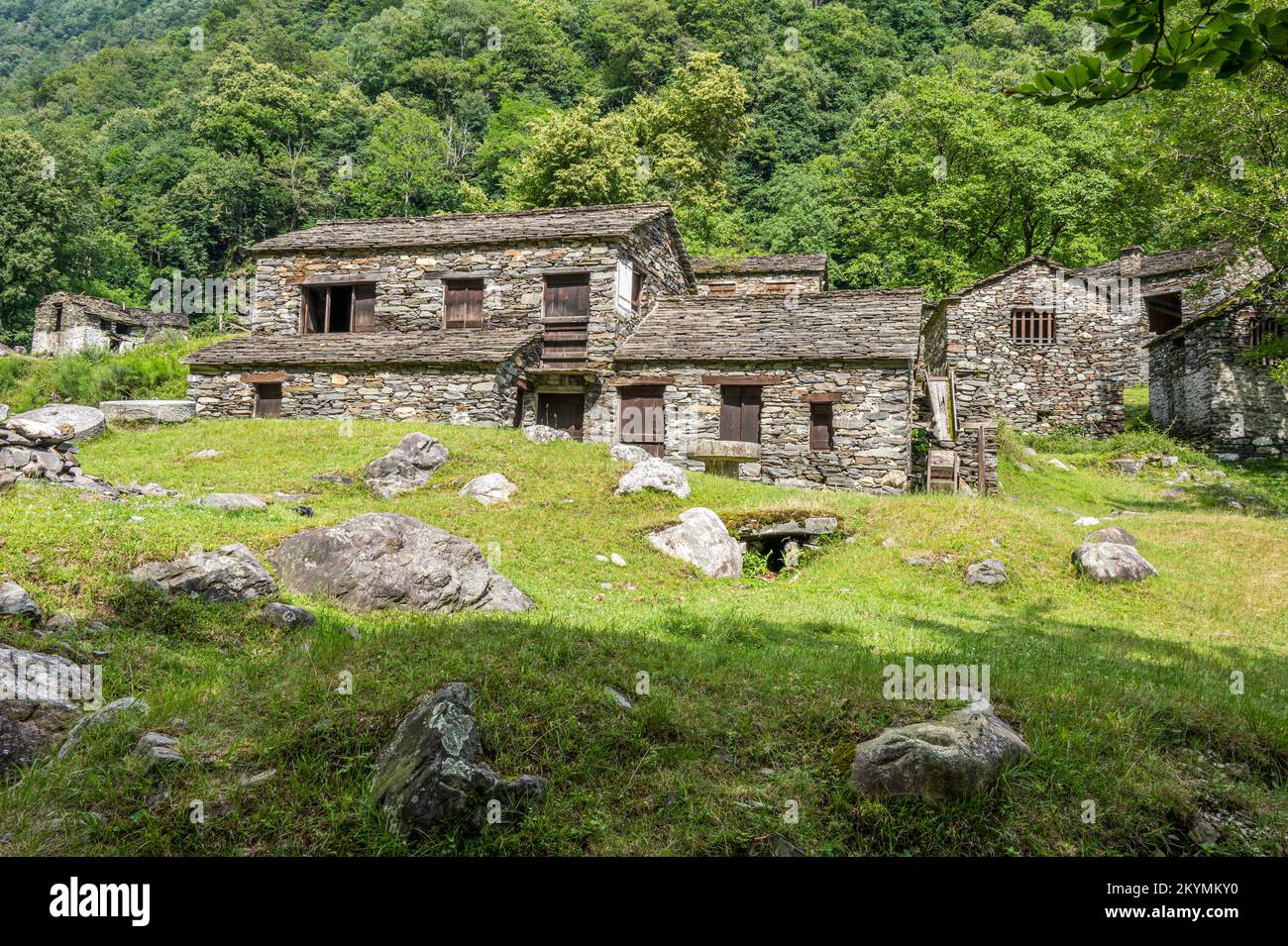 Ruined stone houses and mills in an abandoned mountain village in the ...