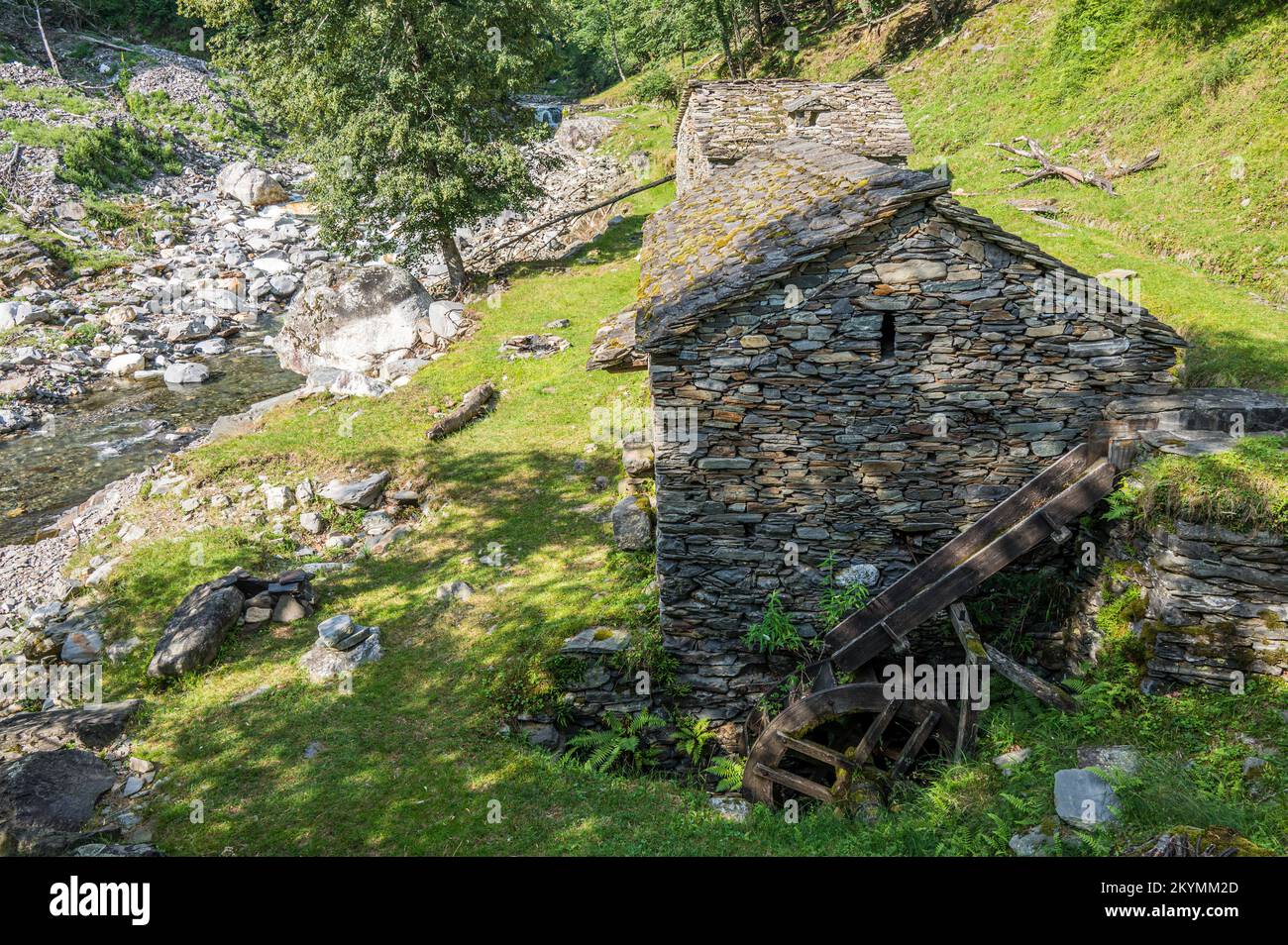 Stone watermill with wooden wheel in an abandoned mountain village in ...