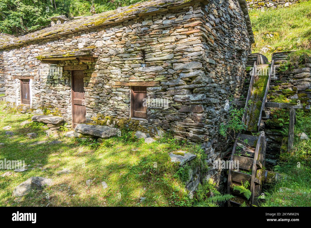 Stone watermill with wooden wheel in an abandoned mountain village in ...