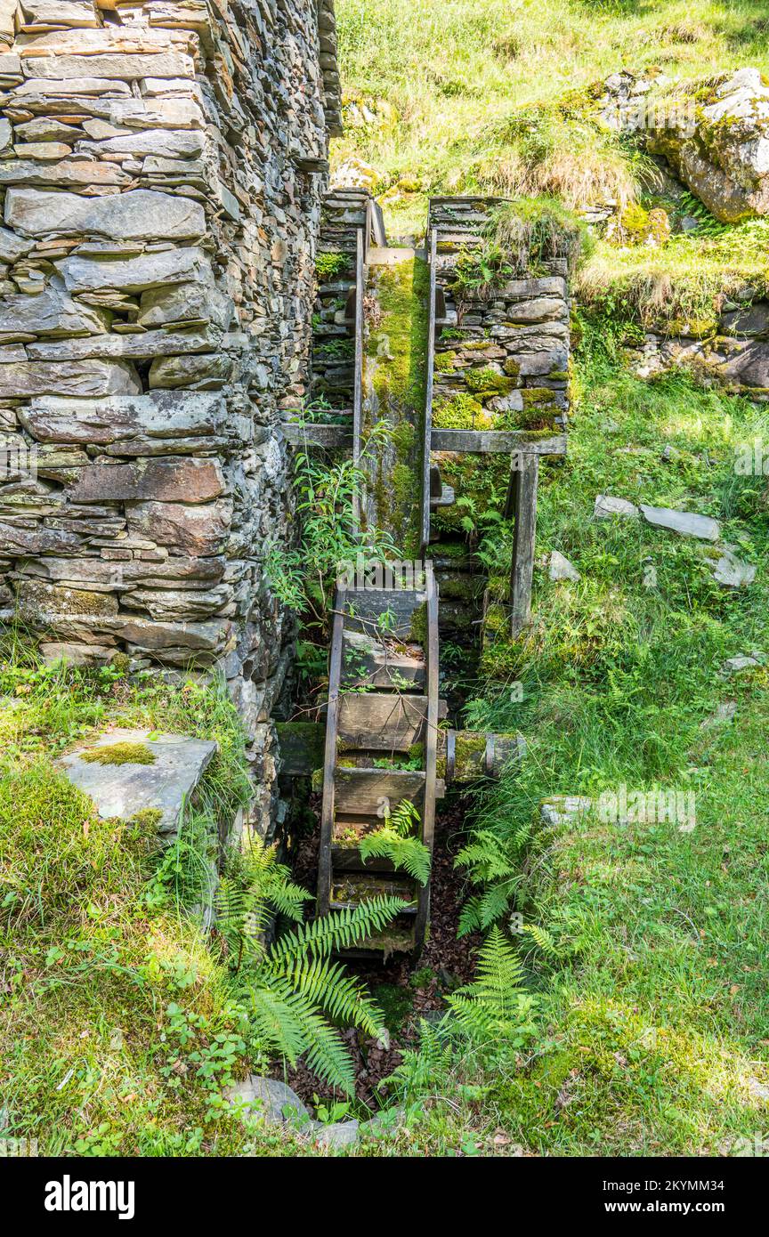 Stone watermill with wooden wheel in an abandoned mountain village in ...